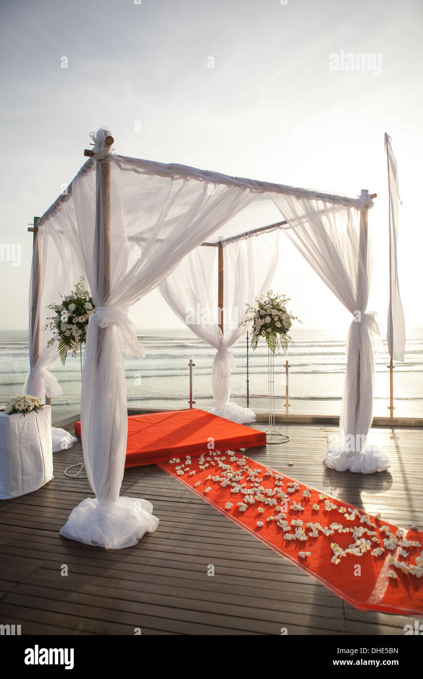 wedding venue setup corridor red flowers decor decoration decorative ...