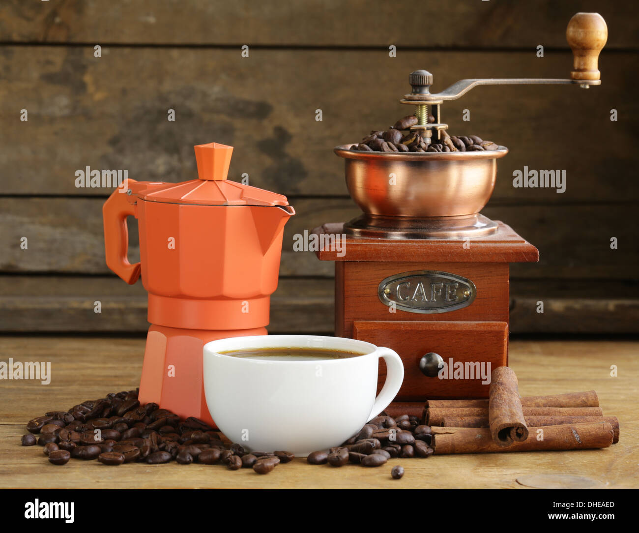 Still life of coffee beans and coffee maker, cup of espresso on vintage ...