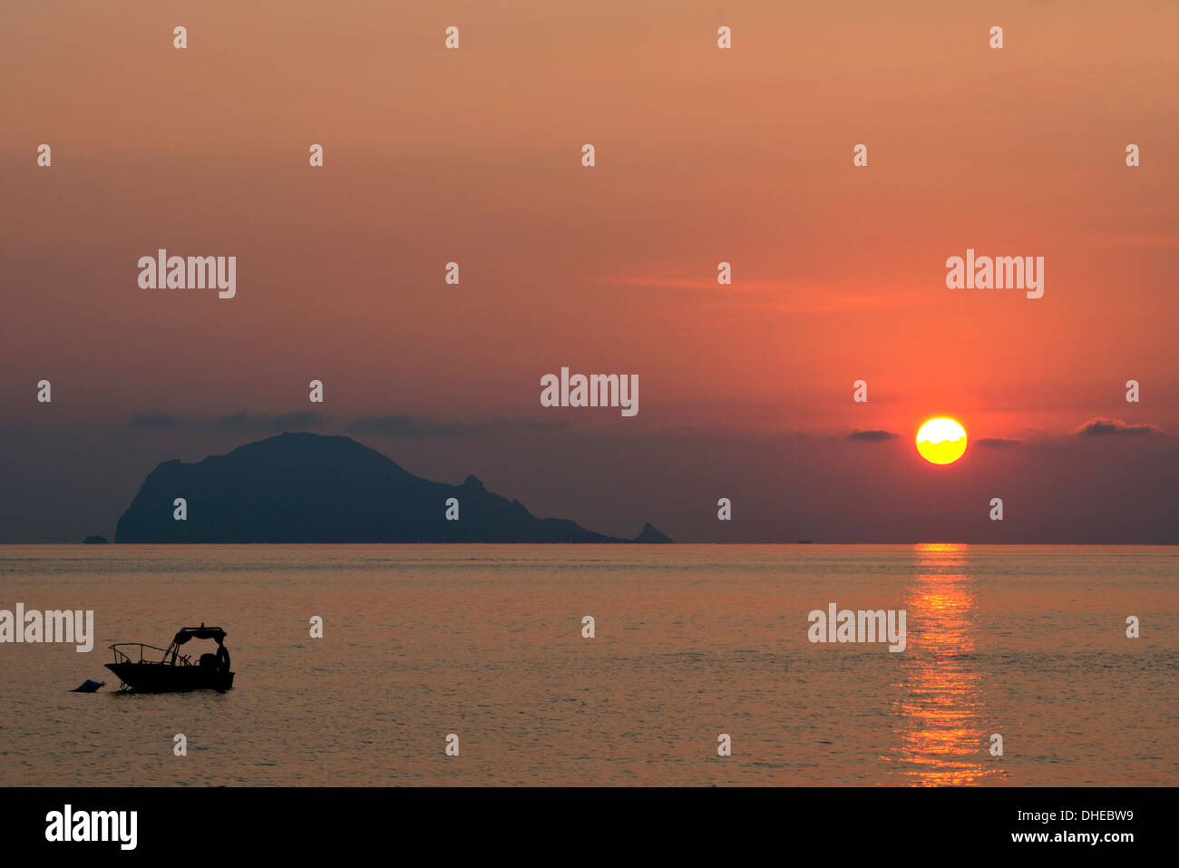 A view to Filicudi Island from Salina Island at sunrise in The Aeolian ...