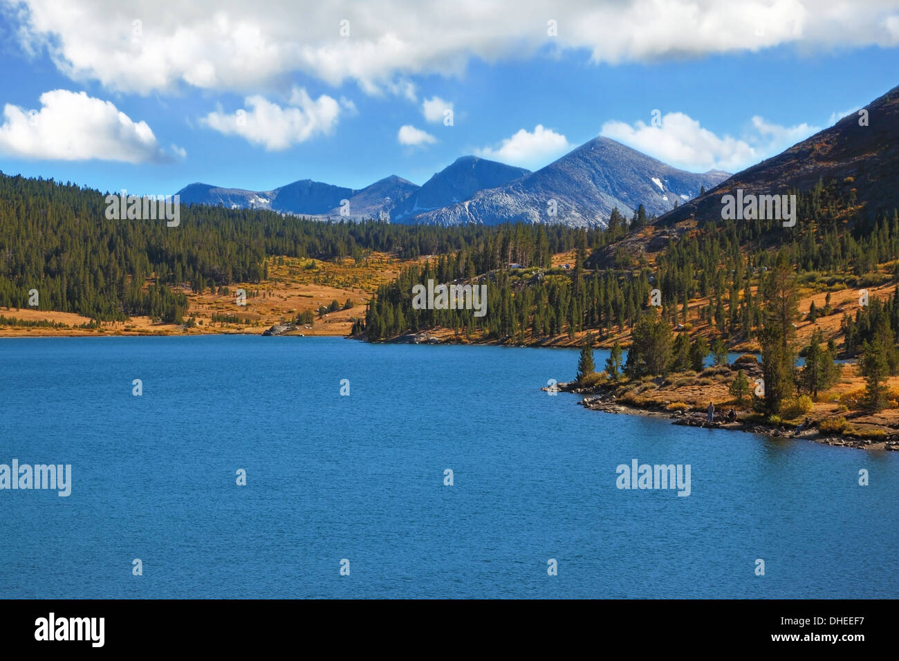 The tops of mountains and azure lake Stock Photo - Alamy