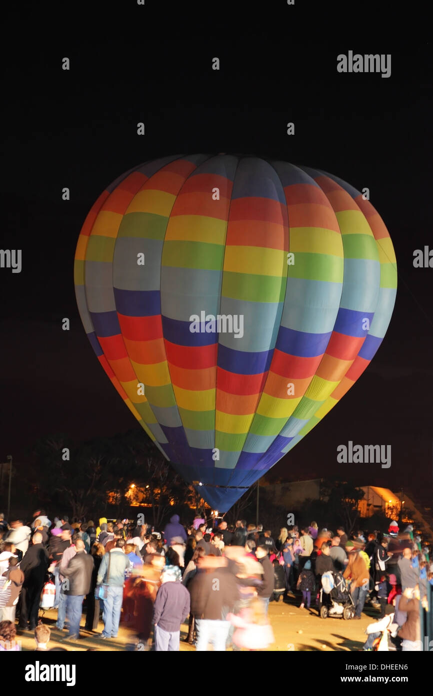 Huge multi-colored balloon in the night sky Stock Photo - Alamy