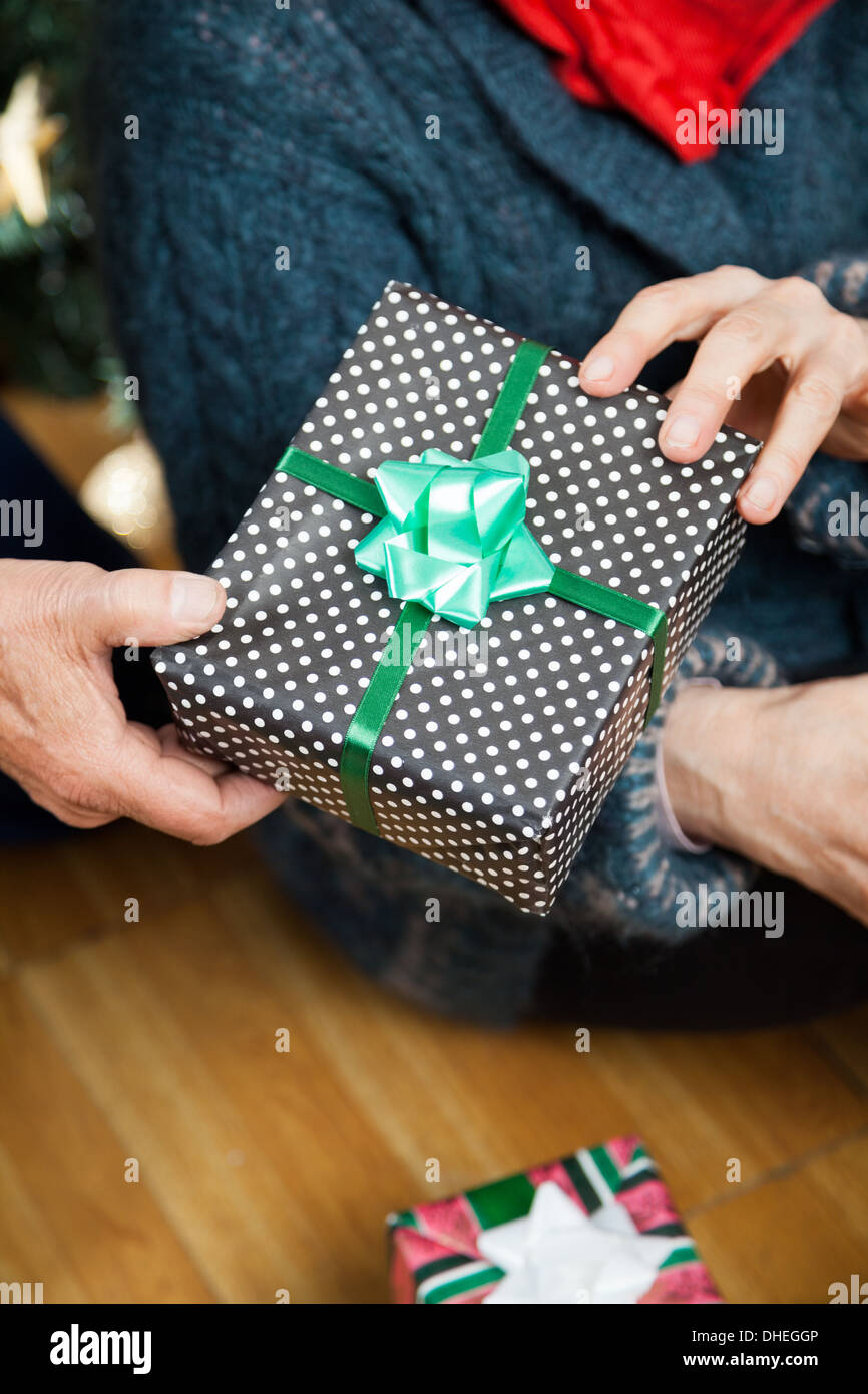 Cropped man holding present hi-res stock photography and images - Alamy
