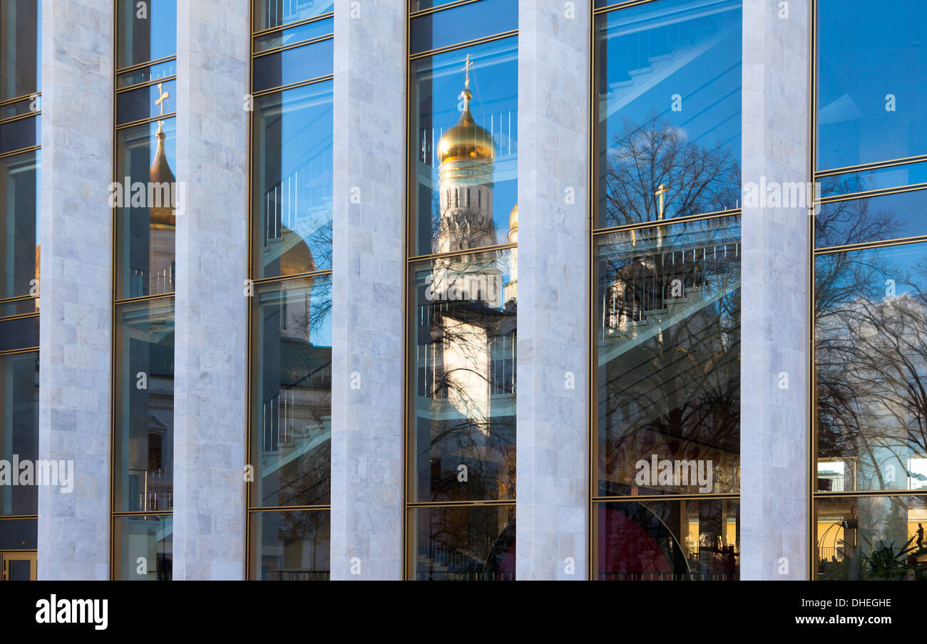 The reflections in the windows of the State Kremlin Palace of ...