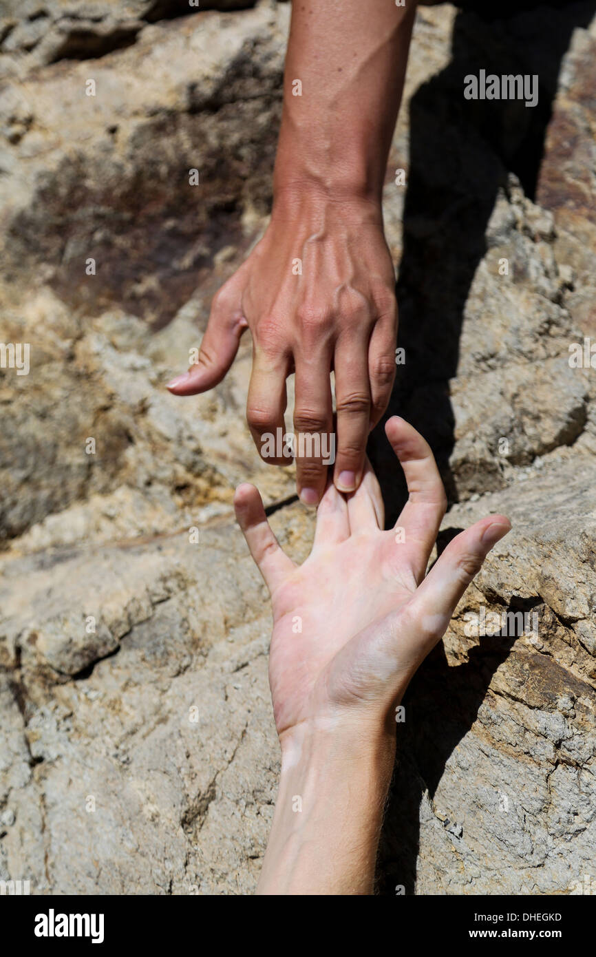 Climbing hands hi-res stock photography and images - Alamy