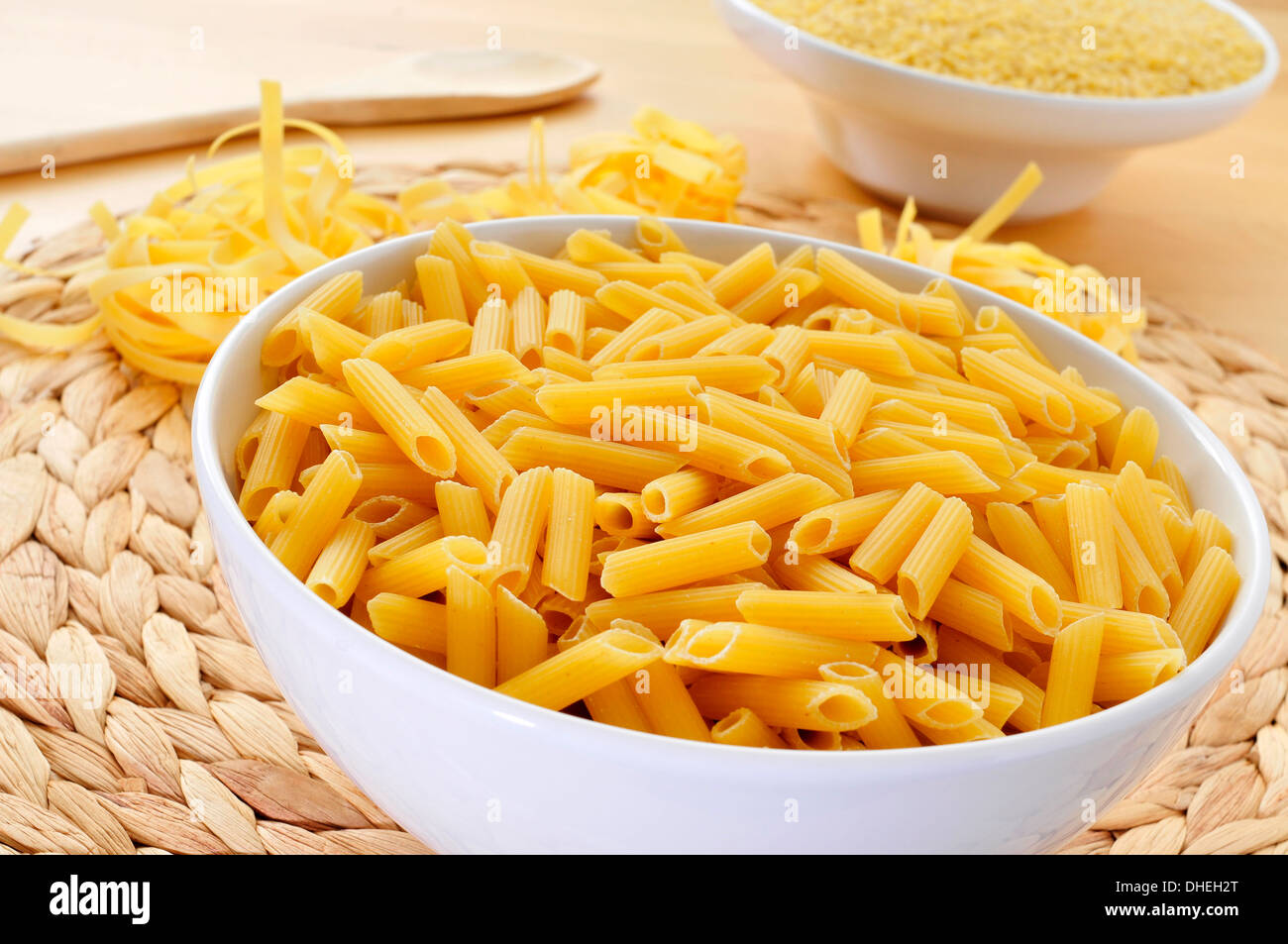 some different uncooked pasta, such as penne rigate, tagliatelle and ...