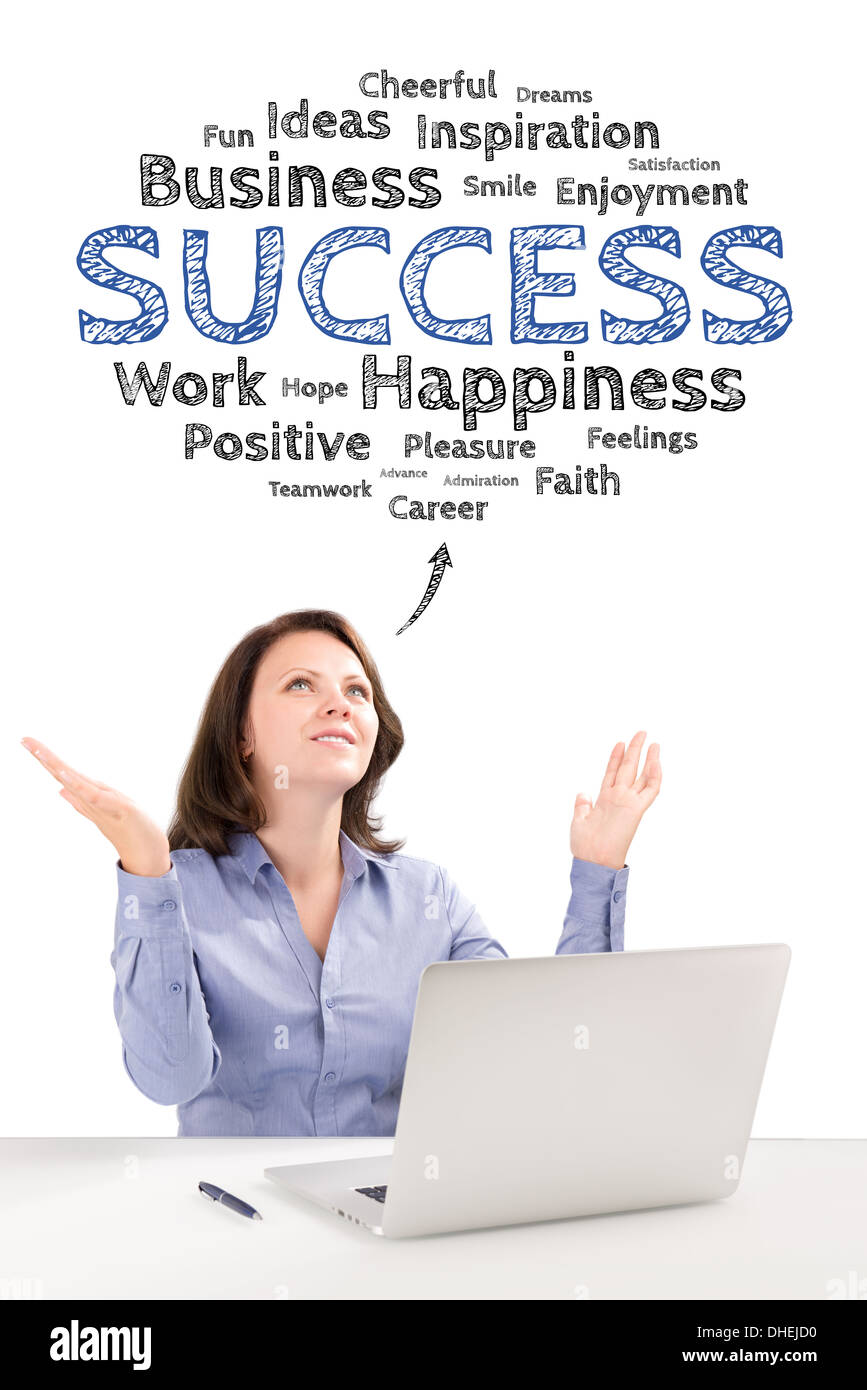 Business woman is sitting under success emotions bubble in front of a ...