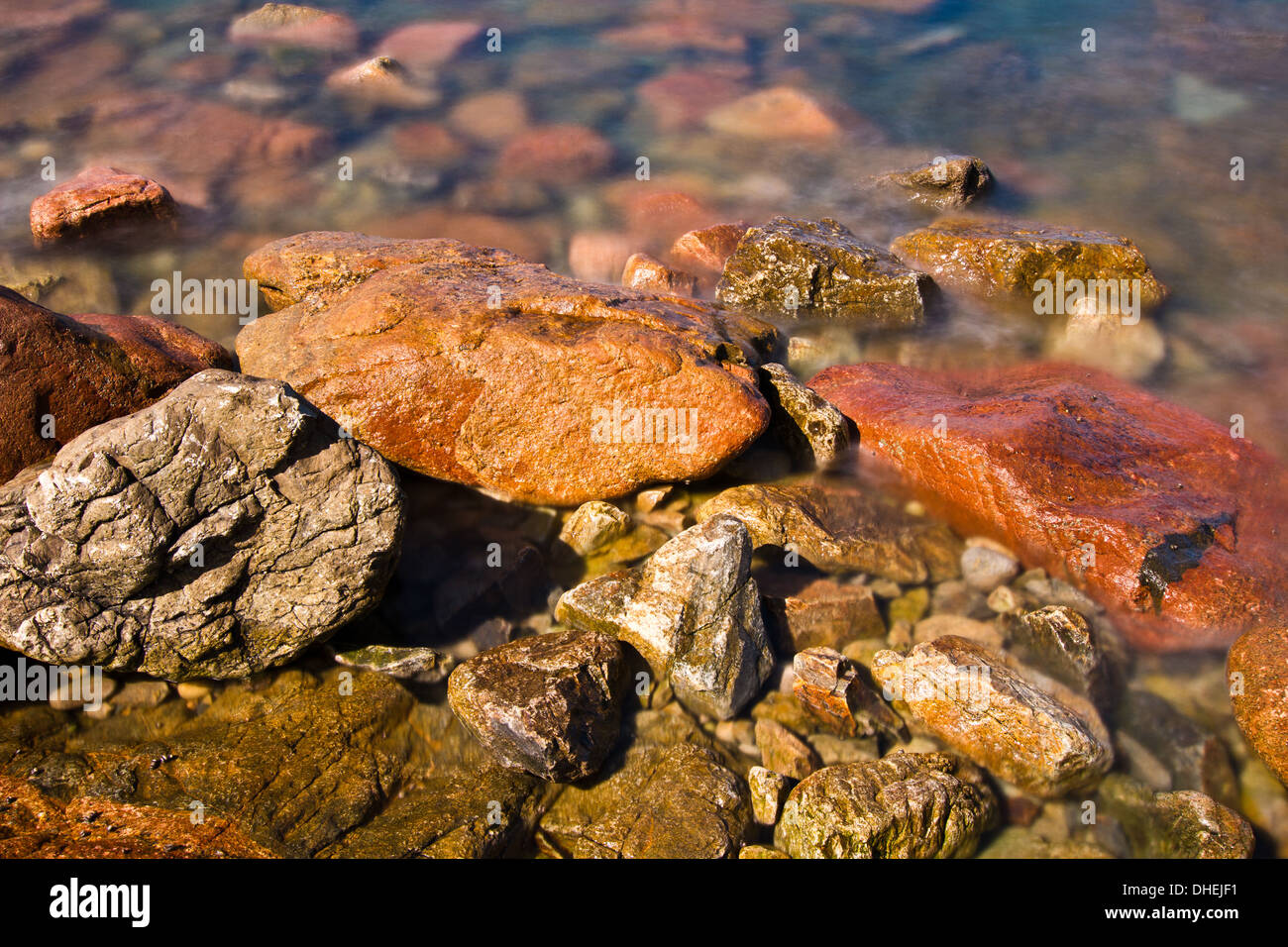 Stones in water Stock Photo - Alamy