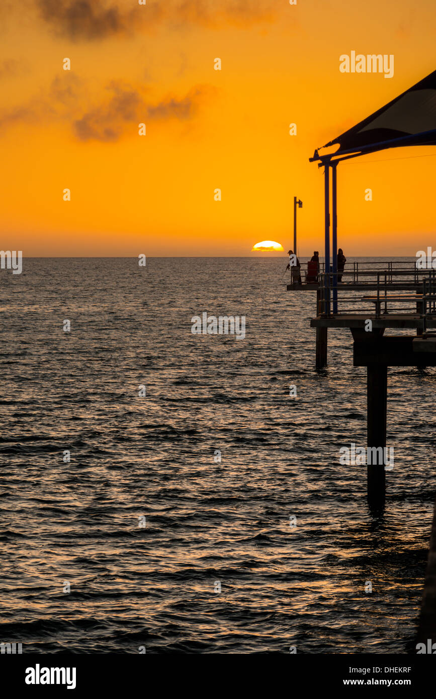 Sunset at a the beautiful Brighton pier in Australia, a seaside with ...