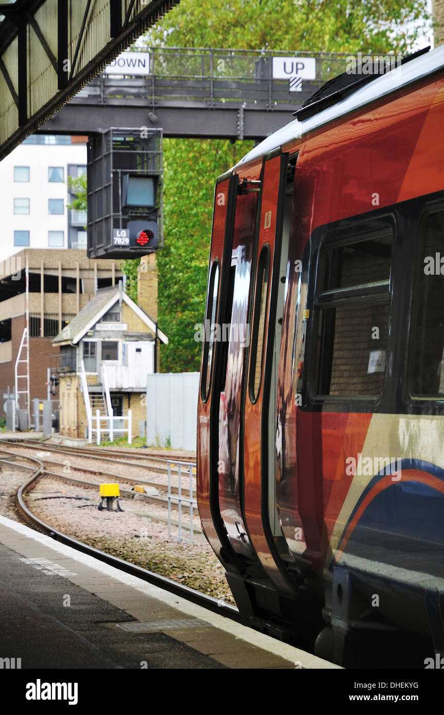 Side view of East Midlands Trains regional train in the platform at ...