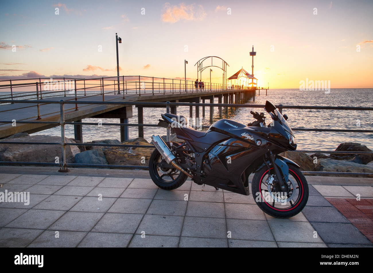 Sunset at a the beautiful Brighton pier in Australia, a seaside with ...