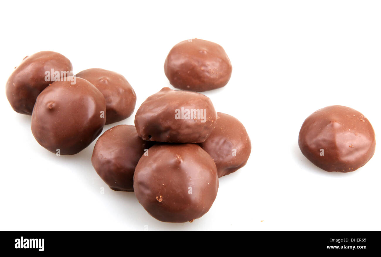 stacked chocolate candy on white background Stock Photo - Alamy