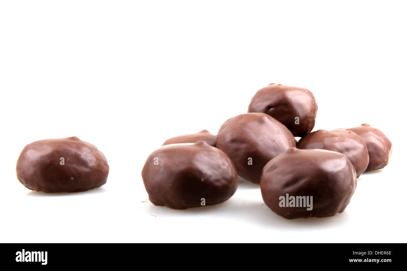 stacked chocolate candy on white background Stock Photo - Alamy