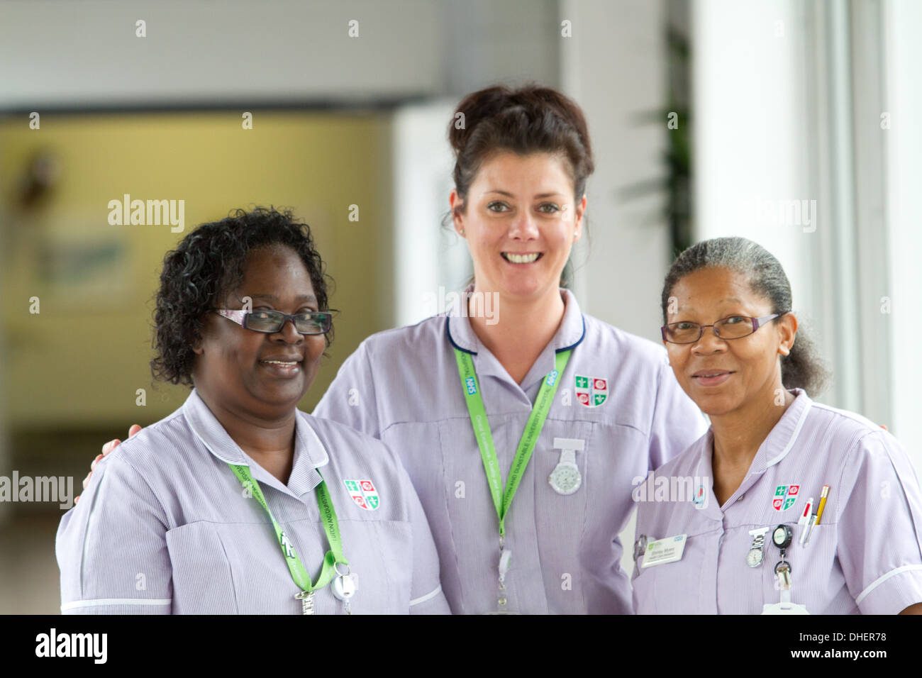 A group of three nurses in a hospital corridor UK Stock Photo - Alamy