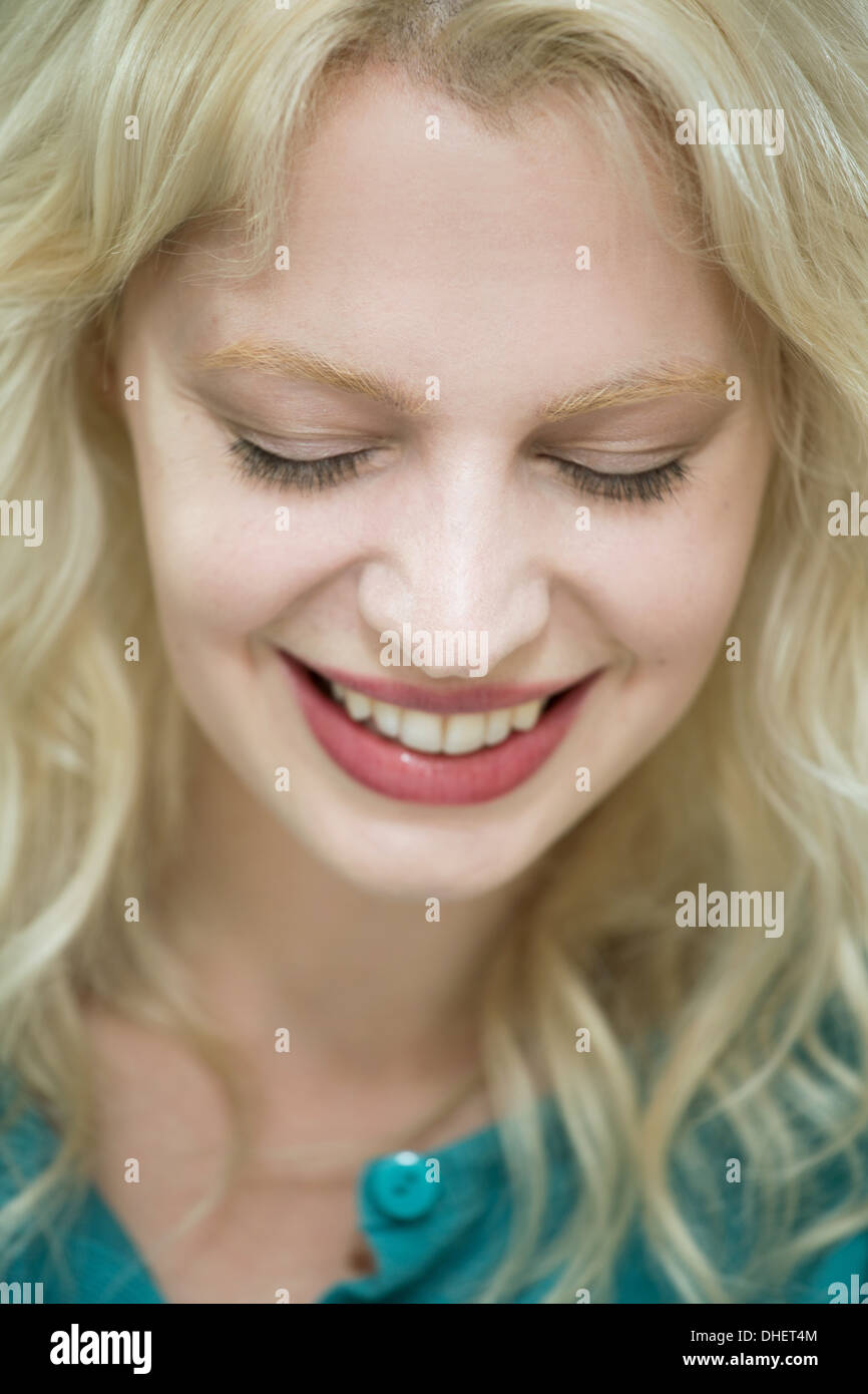 Young woman with eyes closed Stock Photo - Alamy