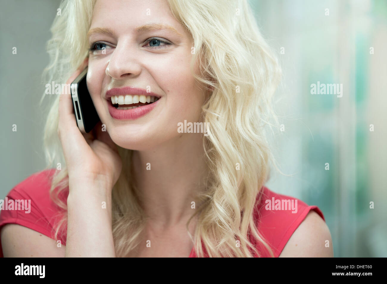 Young female talking on cellphone hi-res stock photography and images ...