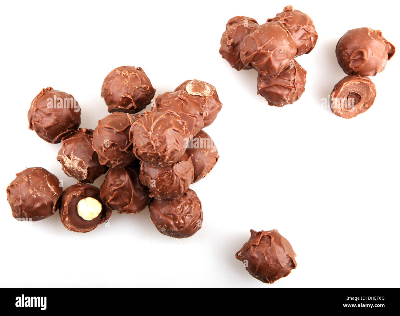 stacked chocolate candy on white background Stock Photo - Alamy