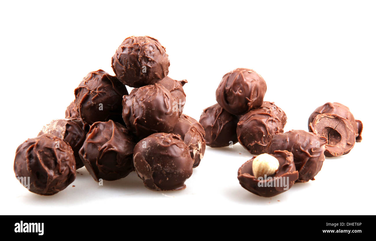 stacked chocolate candy on white background Stock Photo - Alamy