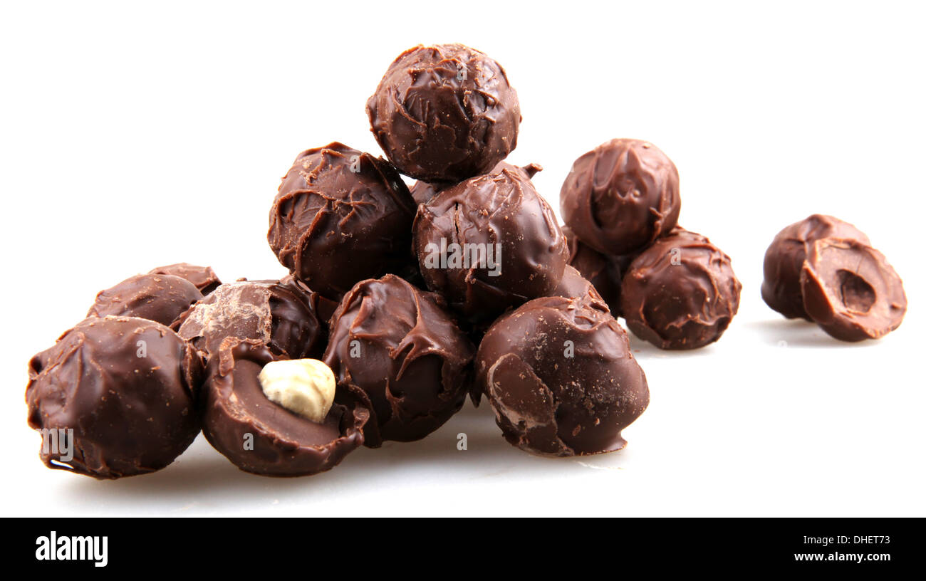 stacked chocolate candy on white background Stock Photo - Alamy