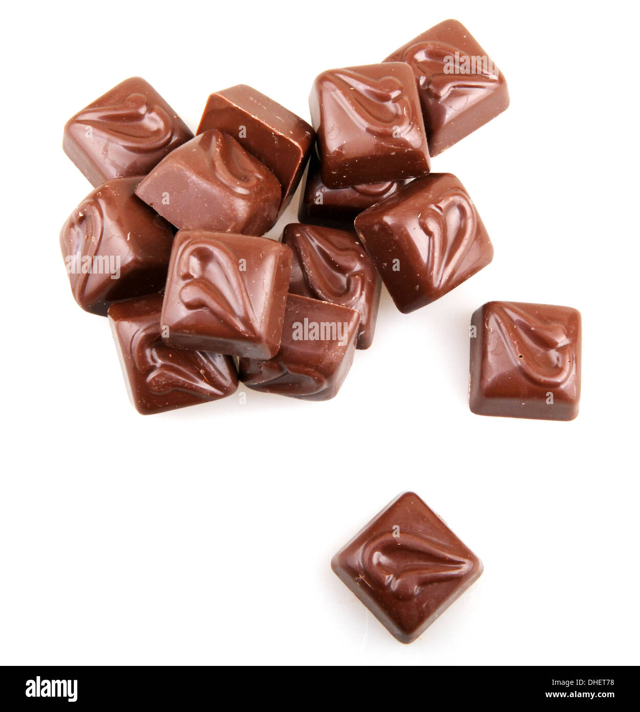 stacked chocolate candy on white background Stock Photo - Alamy