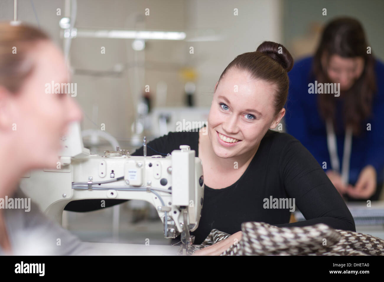 Fashion design students in class Stock Photo - Alamy