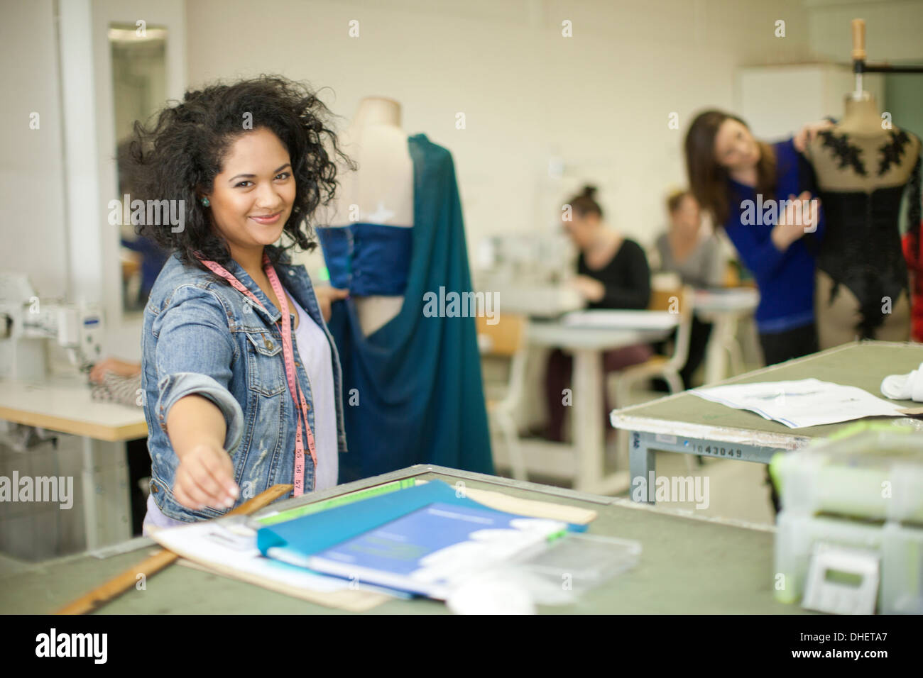 Fashion design students in class Stock Photo - Alamy