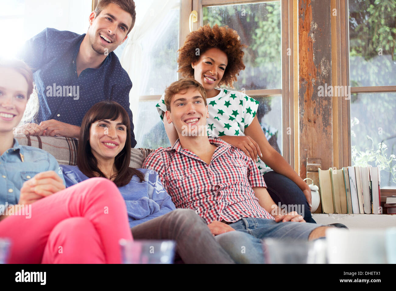 Group of friends smiling Stock Photo - Alamy