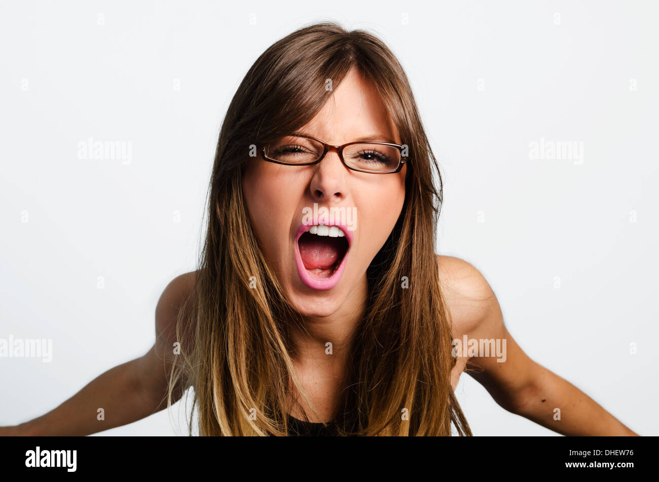 Angry young woman screaming isolated hi-res stock photography and ...