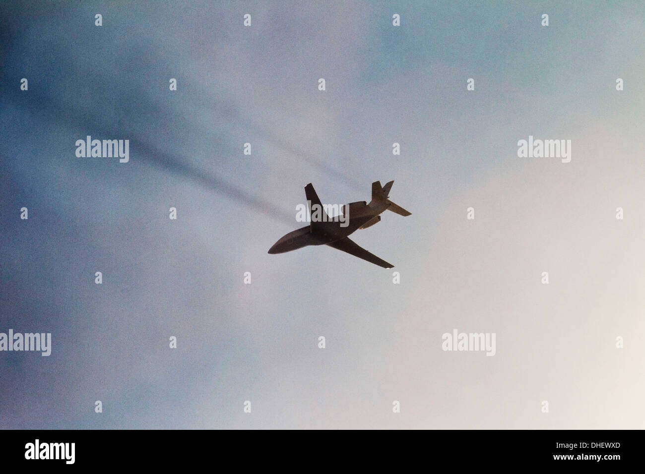 Dassault Falcon 2000 casts a shadow as it flies over Ivinghoe Beacon on ...