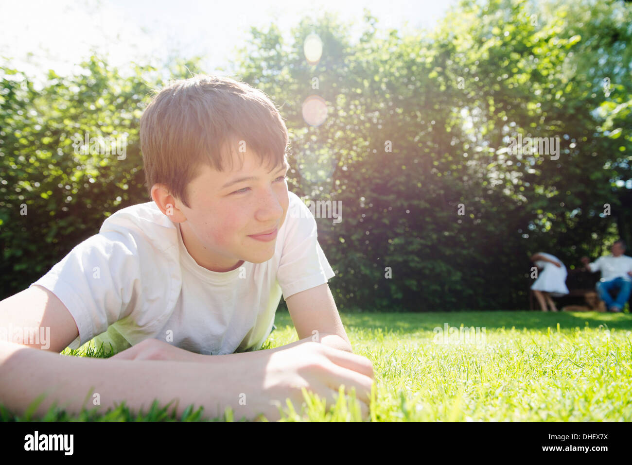 Boy Lying In Grass High Resolution Stock Photography and Images - Alamy