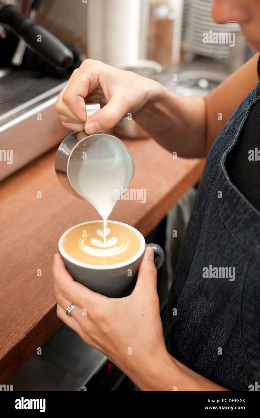 Barista preparing coffee cappuccino in hi-res stock photography and ...