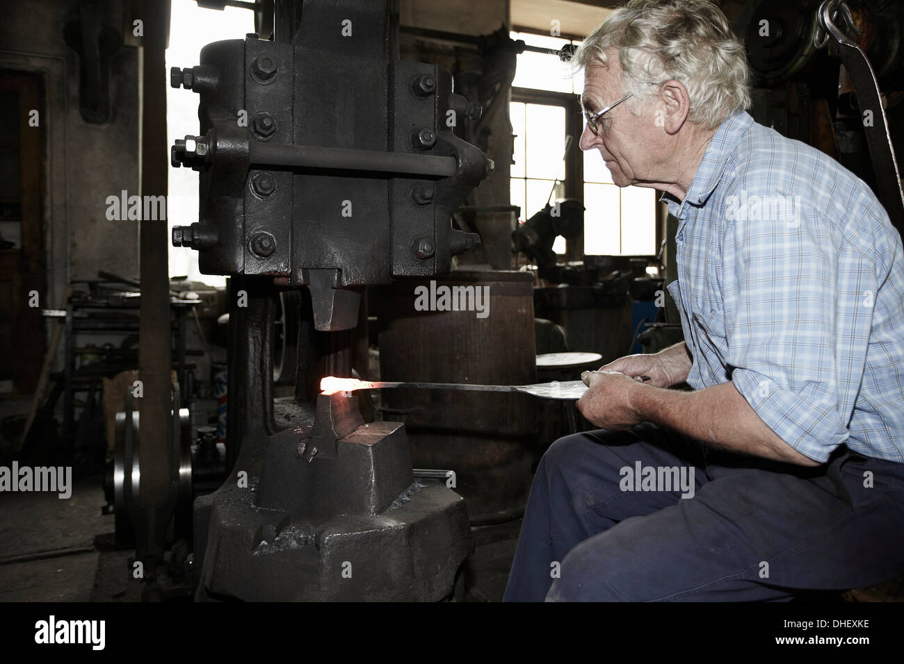 Blacksmith at work Stock Photo - Alamy
