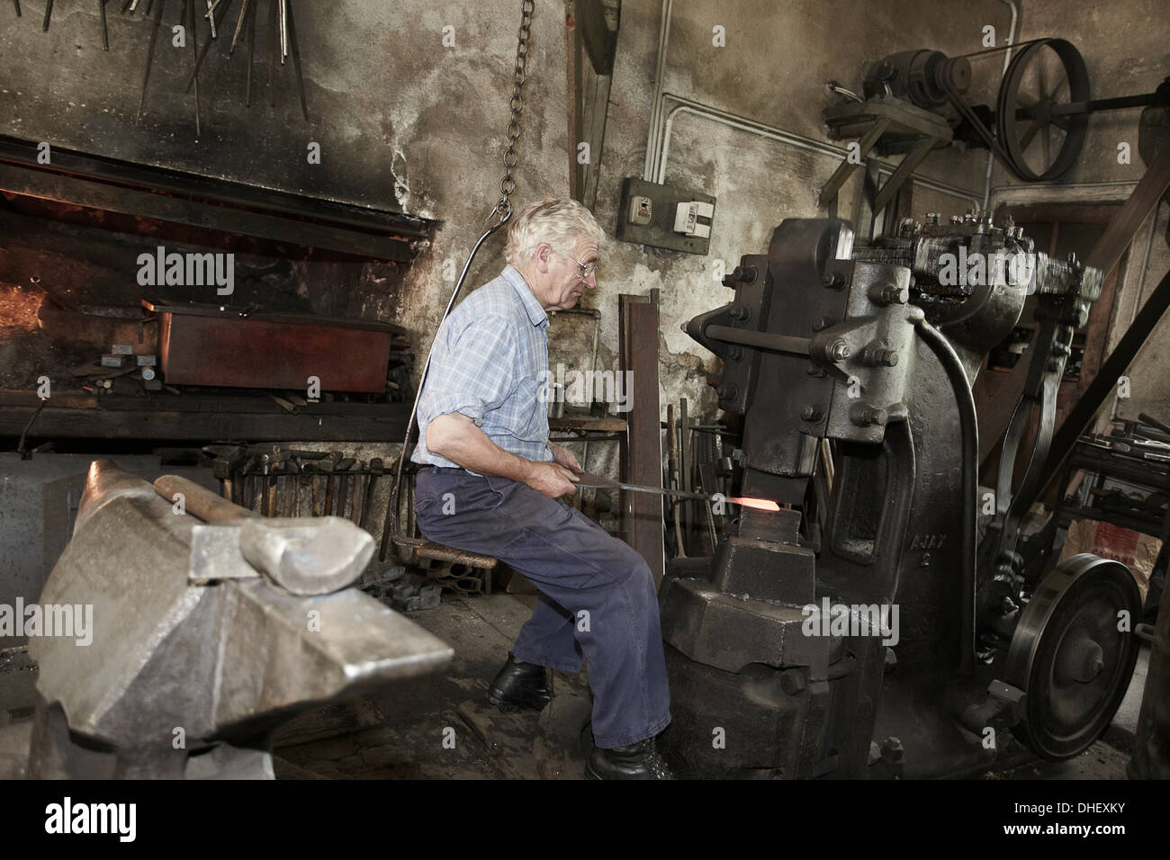 Blacksmith at work Stock Photo - Alamy