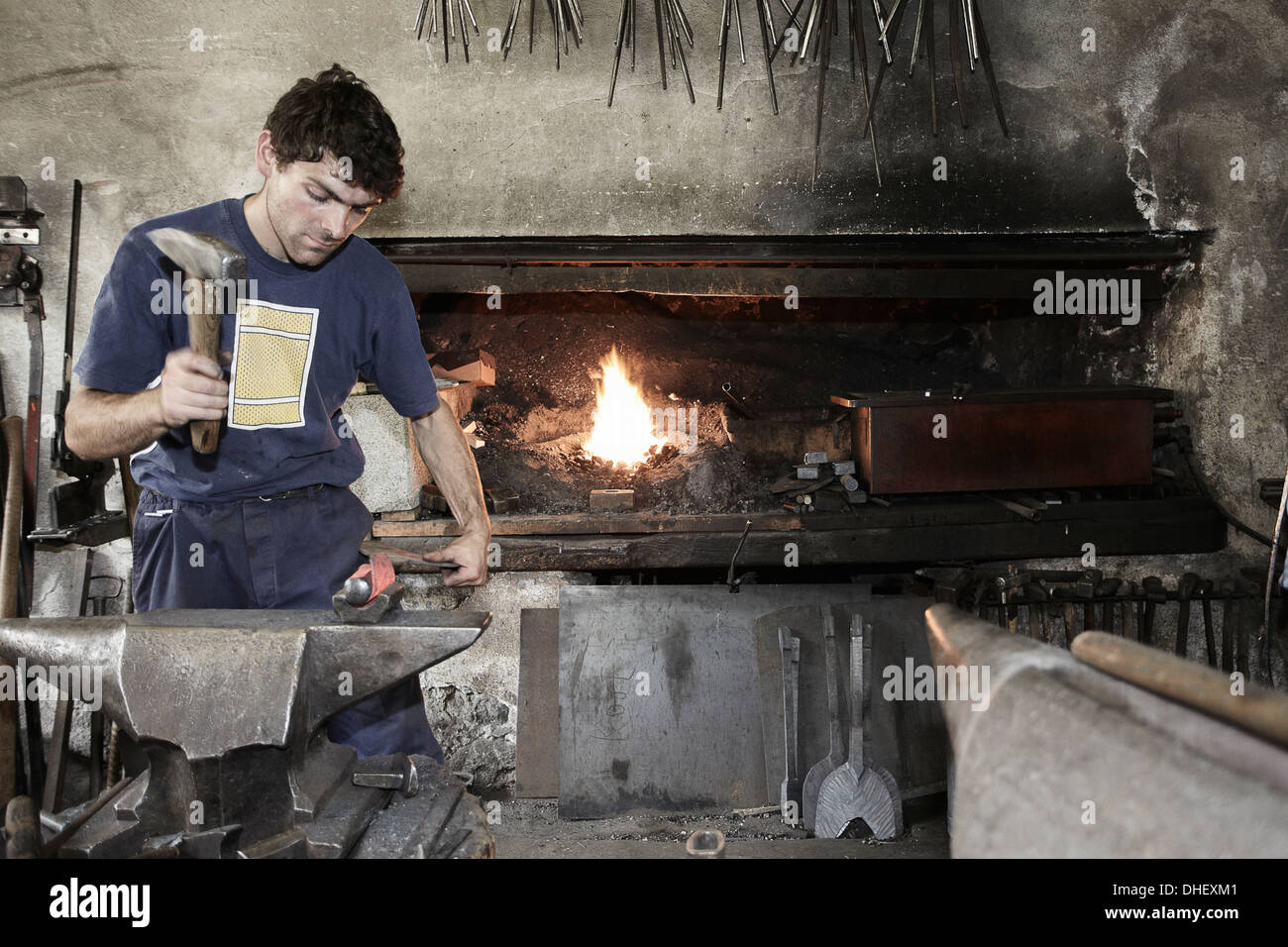 Blacksmith at work Stock Photo - Alamy