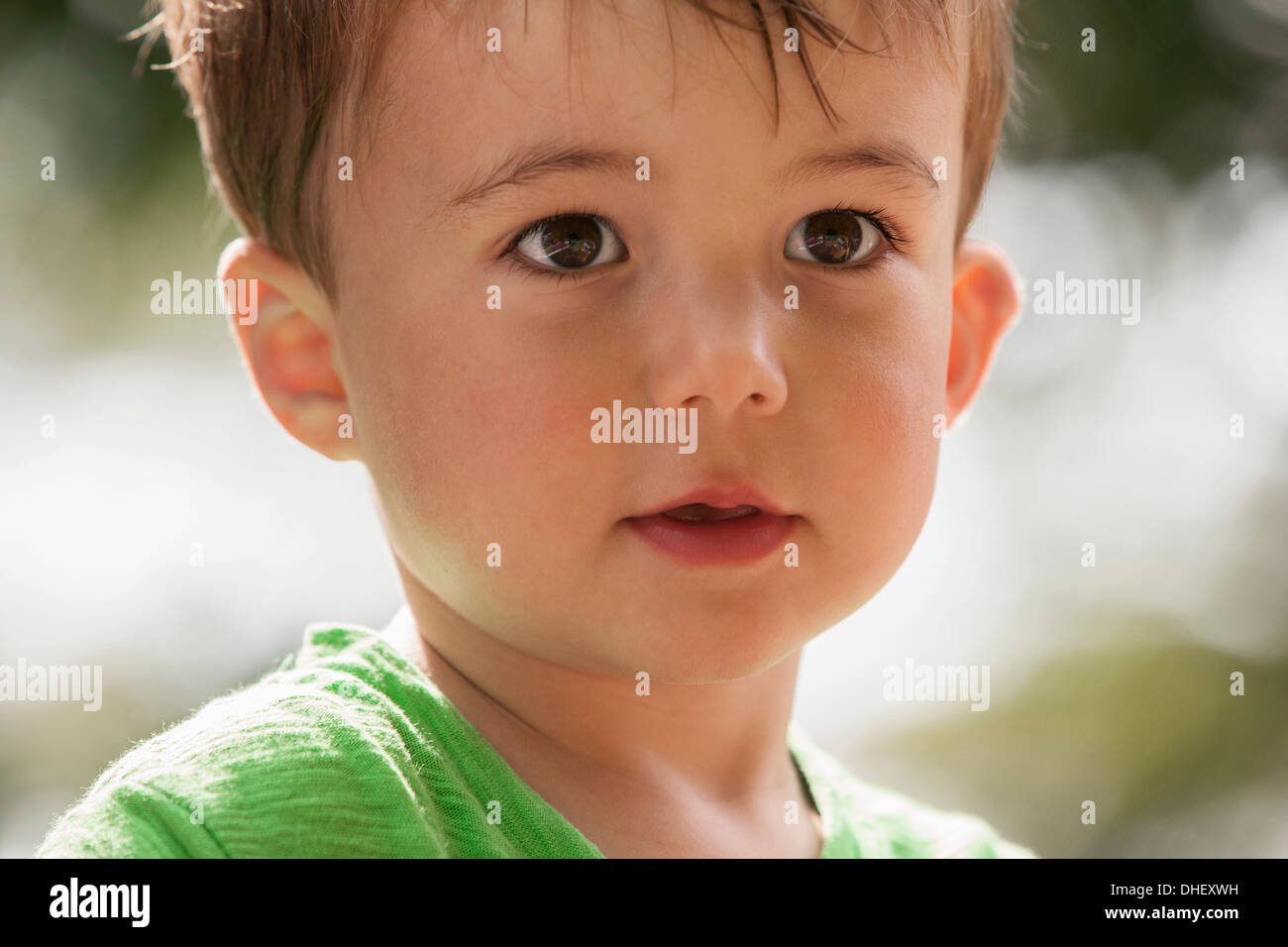 Boy looking into distance Stock Photo - Alamy