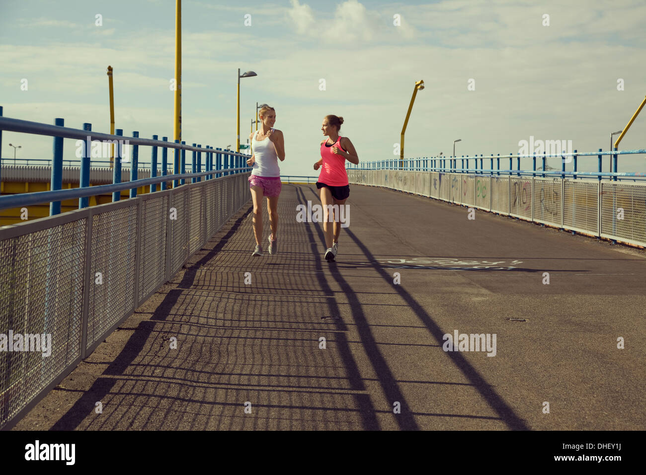 Two young women on bridge hi-res stock photography and images - Alamy