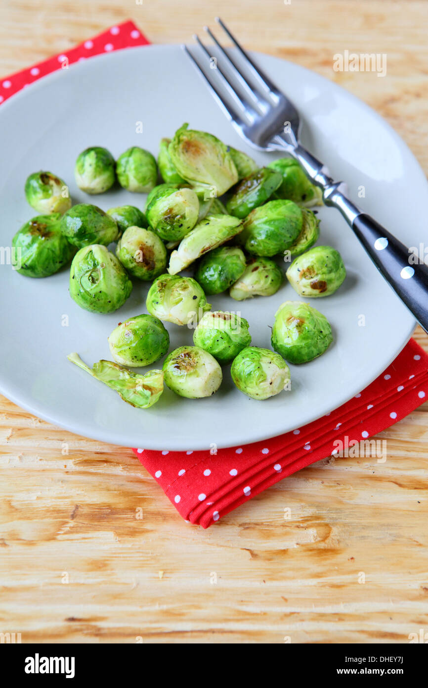 roasted brussels sprouts on a plate, food Stock Photo - Alamy