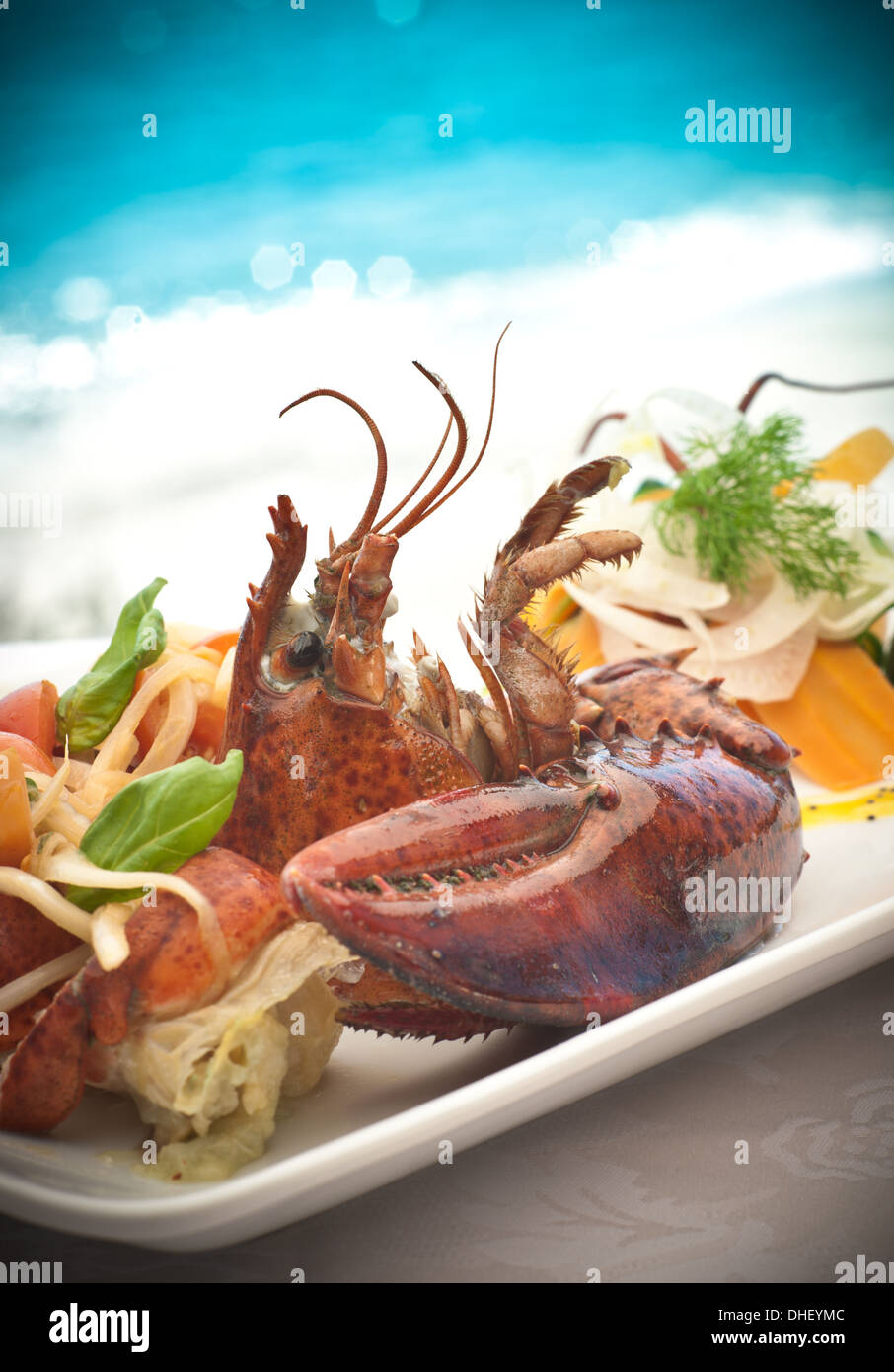 Still life of seafood platter with basil and dill garnish Stock Photo ...