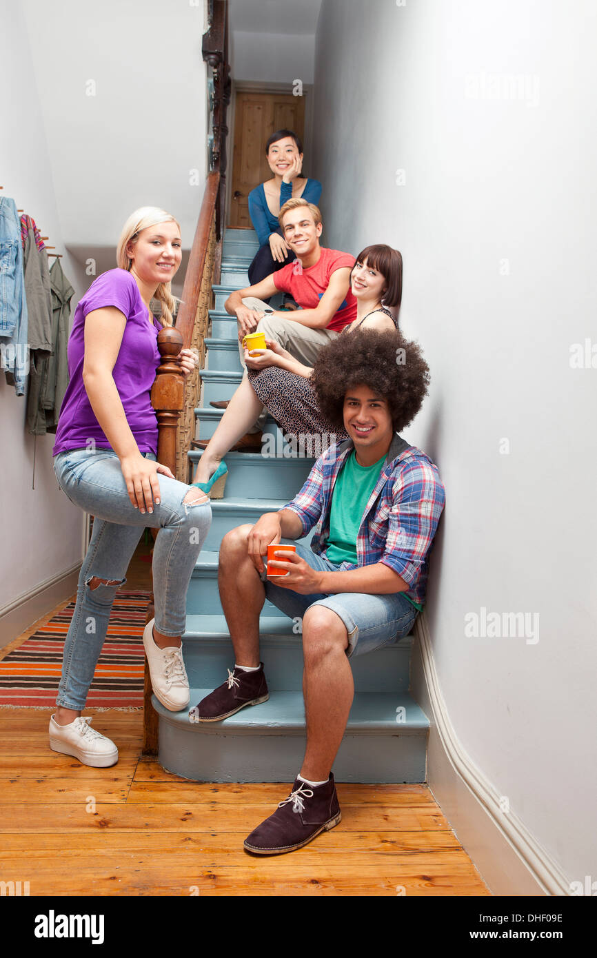 Adult sitting on stairs hi-res stock photography and images - Alamy
