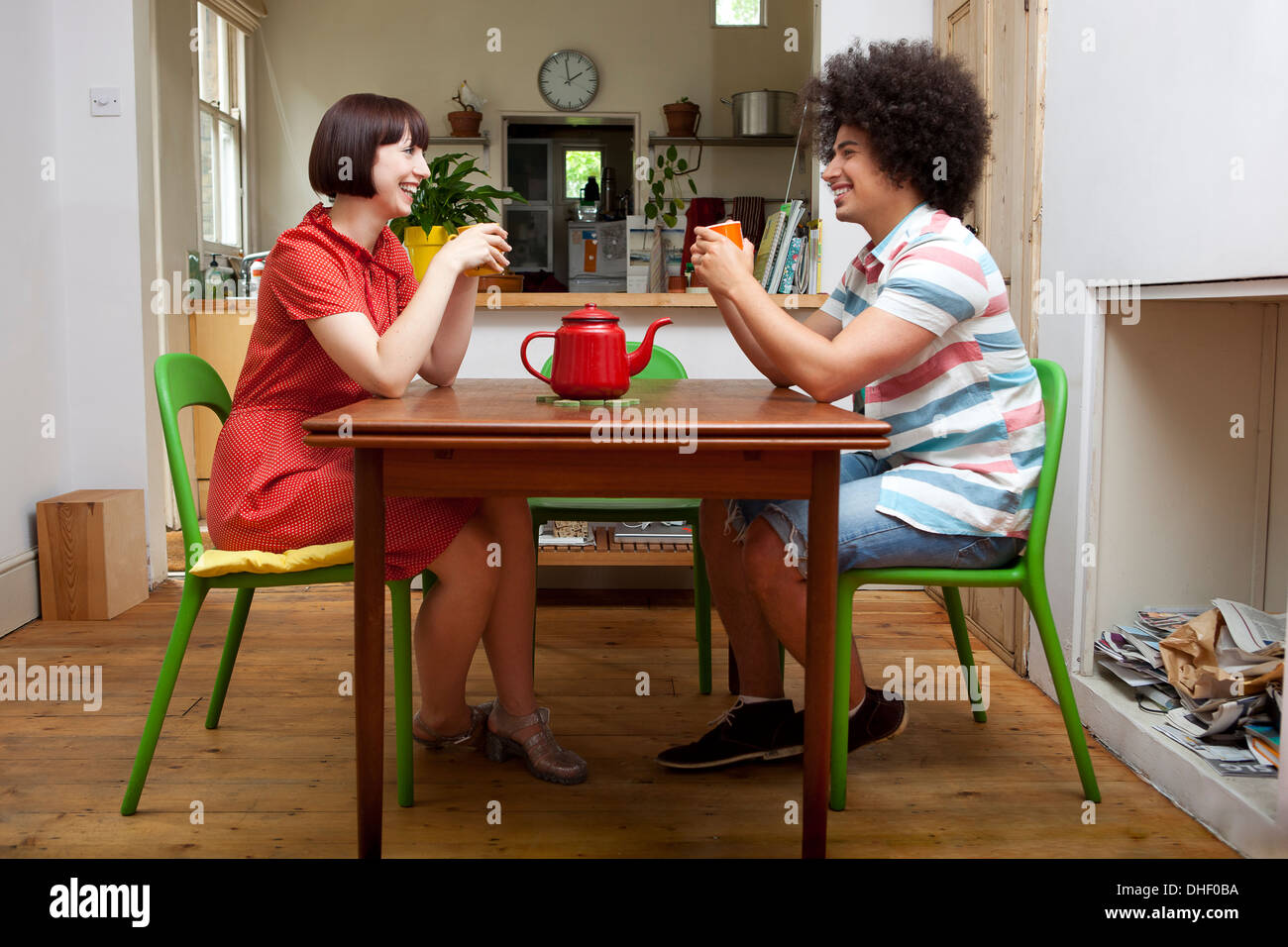 Couple Sitting Side By Side At Table High Resolution Stock Photography ...