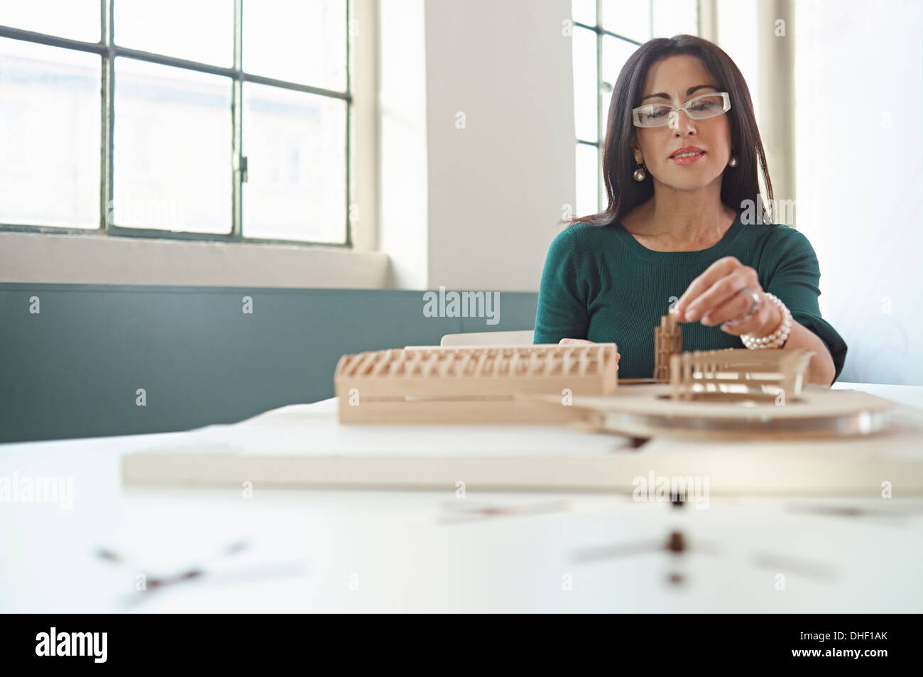 Female architect with model Stock Photo - Alamy