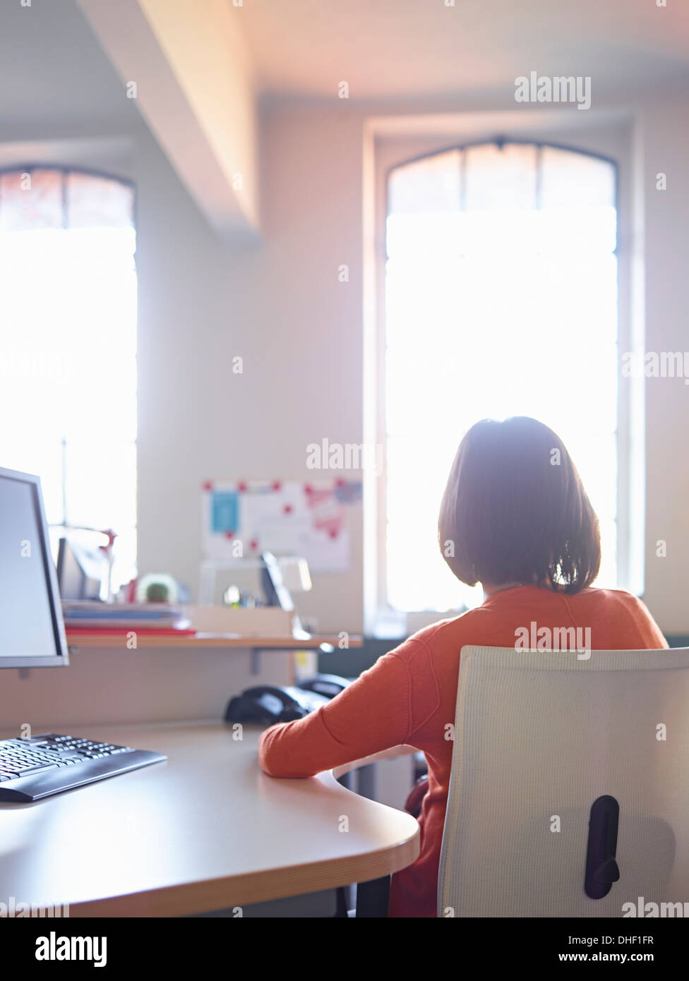 Office worker computer woman rear hi-res stock photography and images ...