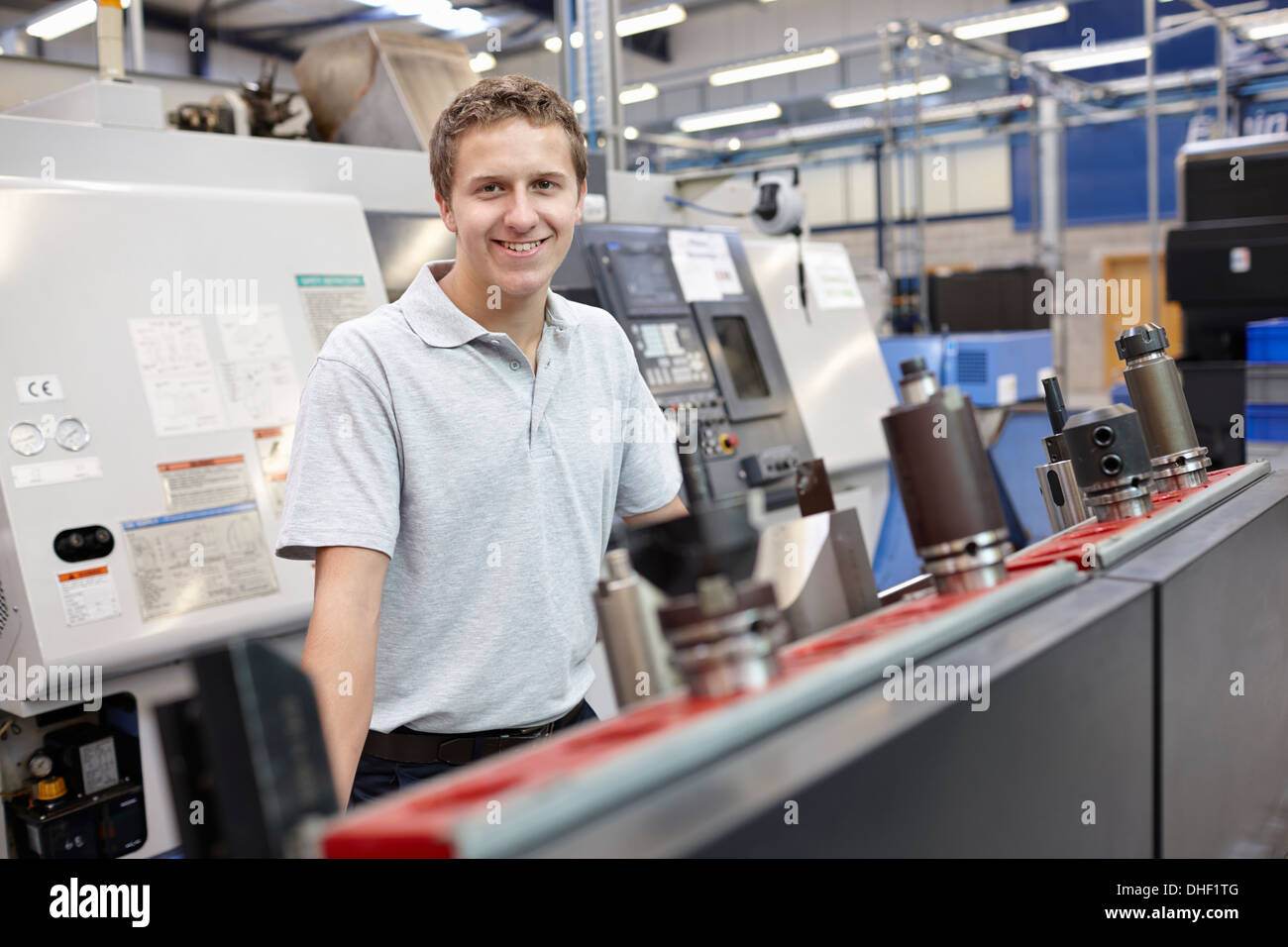 Portrait of worker in engineering factory Stock Photo - Alamy
