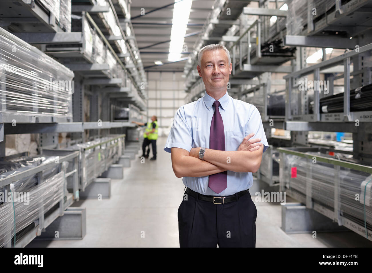 Portrait of manager in engineering warehouse Stock Photo - Alamy
