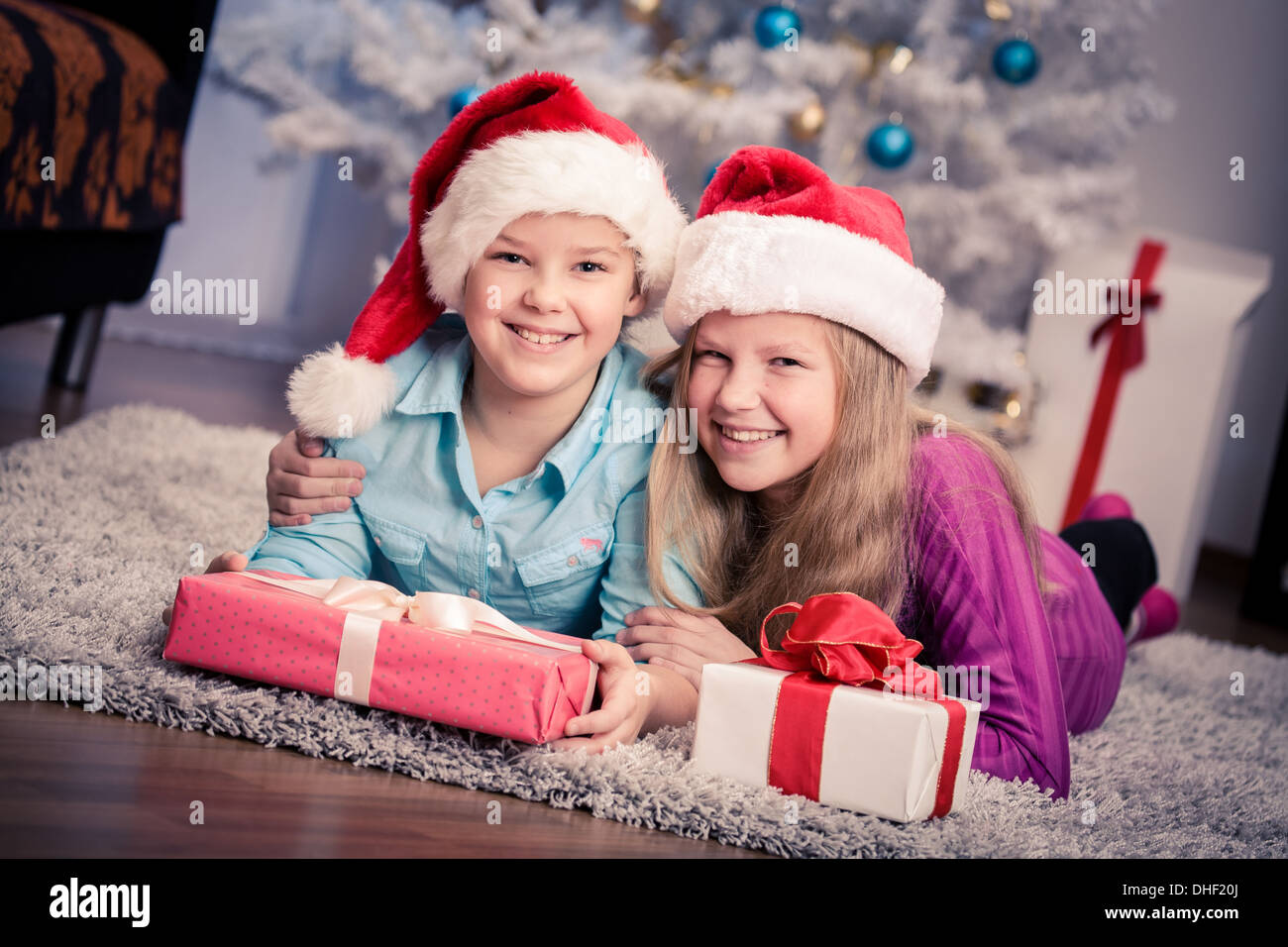 Child getting present christmas hi-res stock photography and images - Alamy