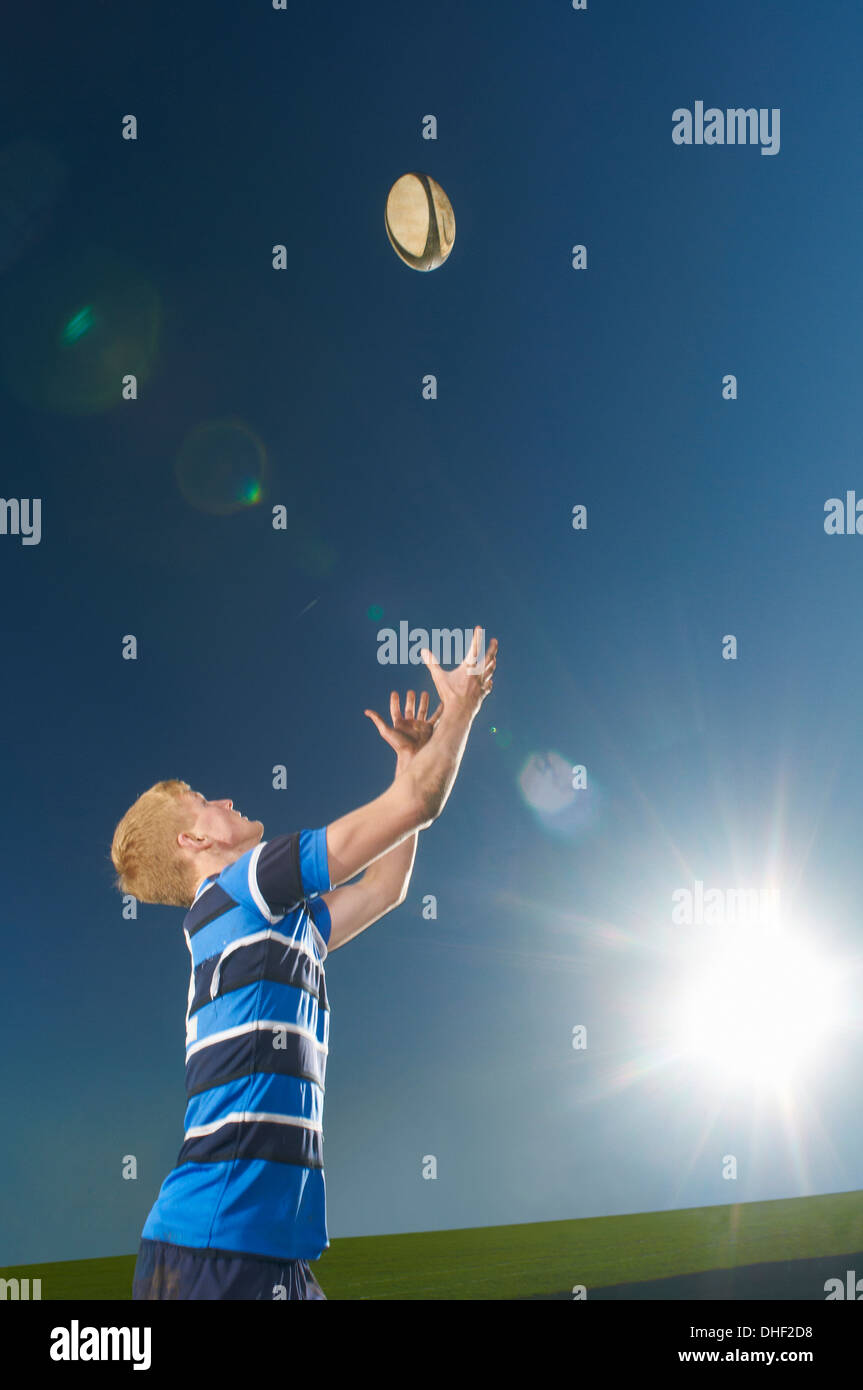 Man catching ball hi-res stock photography and images - Alamy