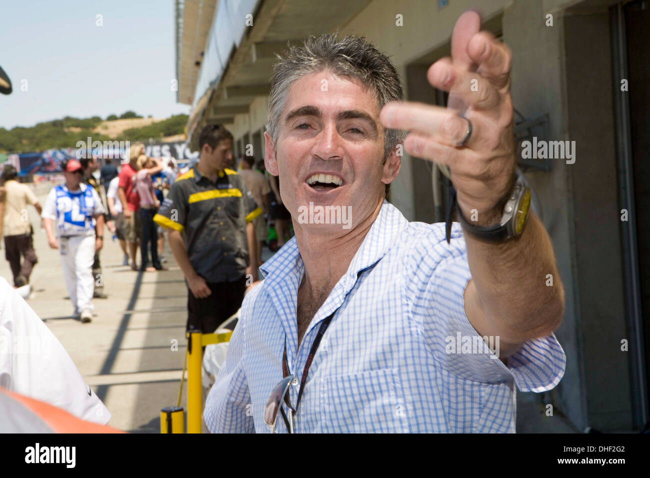 MotoGP champion Mick Doohan in a happy mood in the pits at the USGP ...