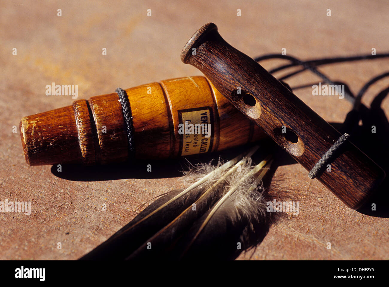 Wooden duck calls and pintail feathers Stock Photo - Alamy