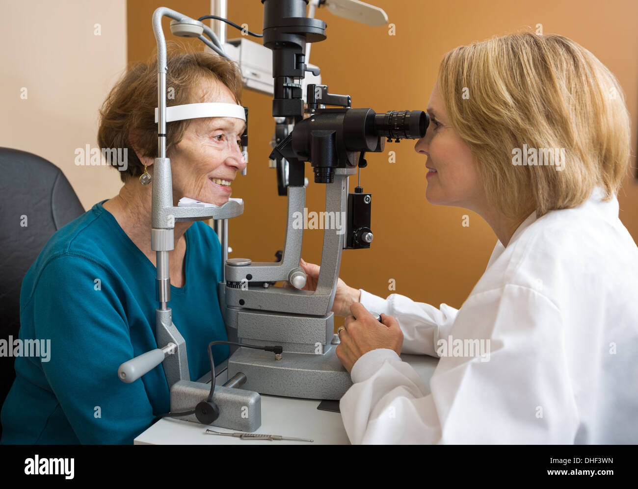 Eye Doctor Examining Woman's Vision Stock Photo - Alamy