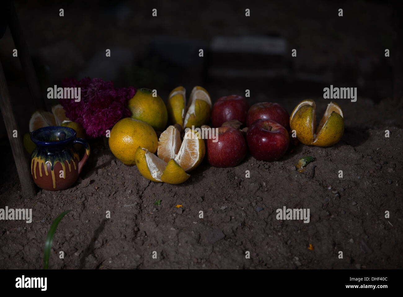 Food decorate a grave of Teotitlan del Valle cemetery during the Day of ...