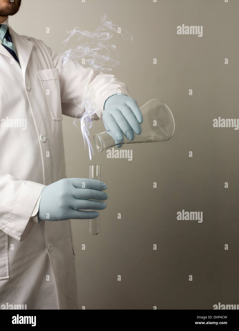 Man pouring chemicals hi-res stock photography and images - Alamy